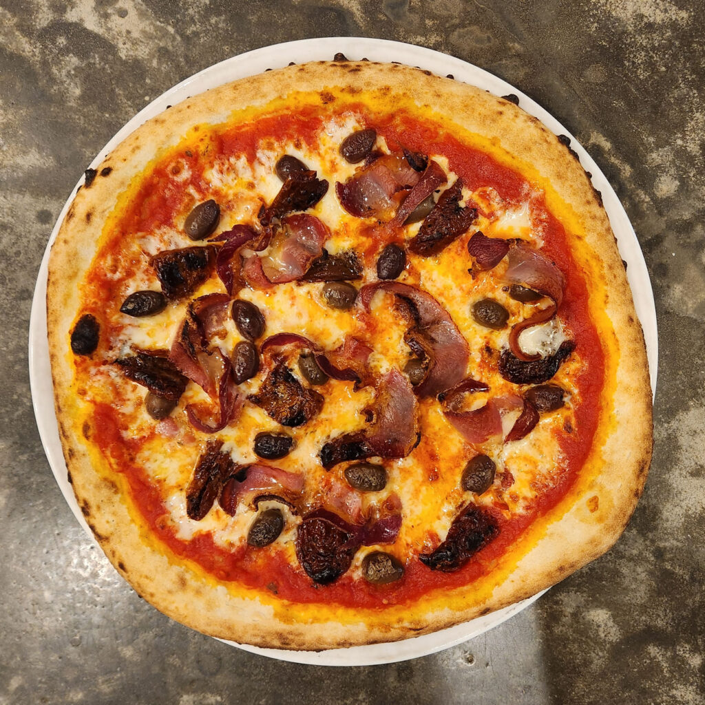 'Special One' Pizza for April 2024 (Limited-time only) - Woody's Pizza & Co